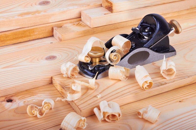 Small Block Plane and Wood with Shavings Stock Photo - Image of hand ...