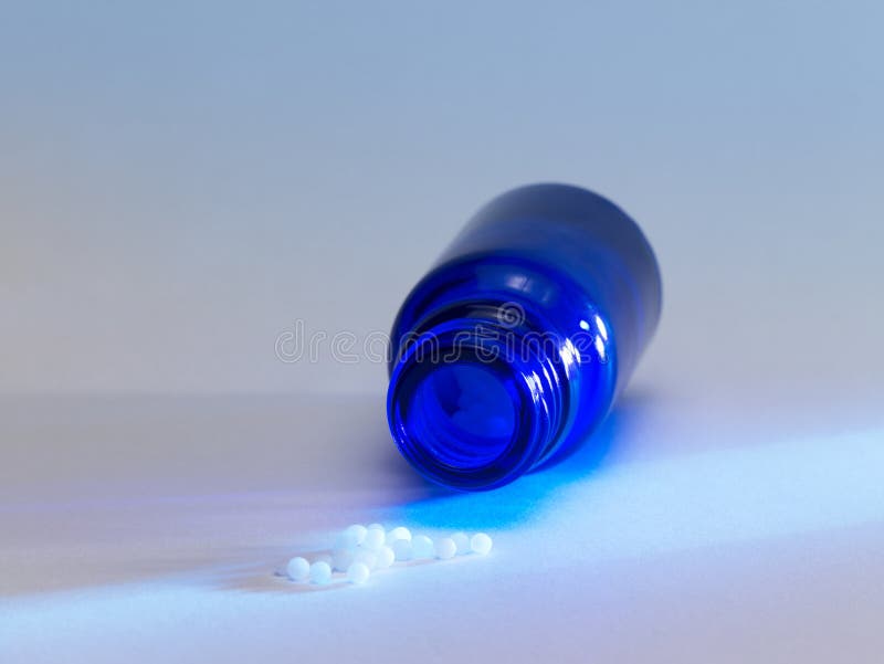 Small Blue Bottle and Globules Stock Image - Image of flask, dose: 39519799