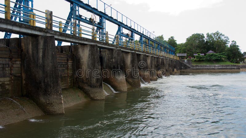Small Blue Dam and Bridge Crossing River in Asia. Stock Image - Image ...