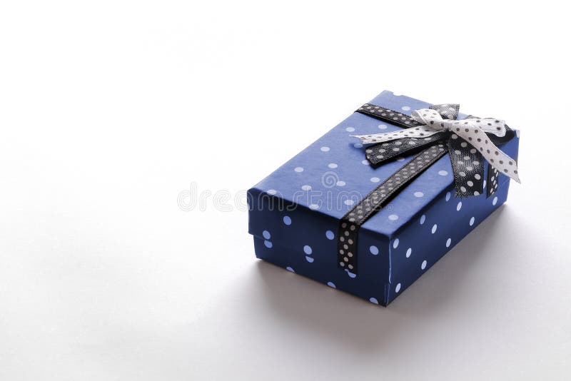 Small Blue Gift Box With Ribbon And Circles Stock Photo - Image of ...