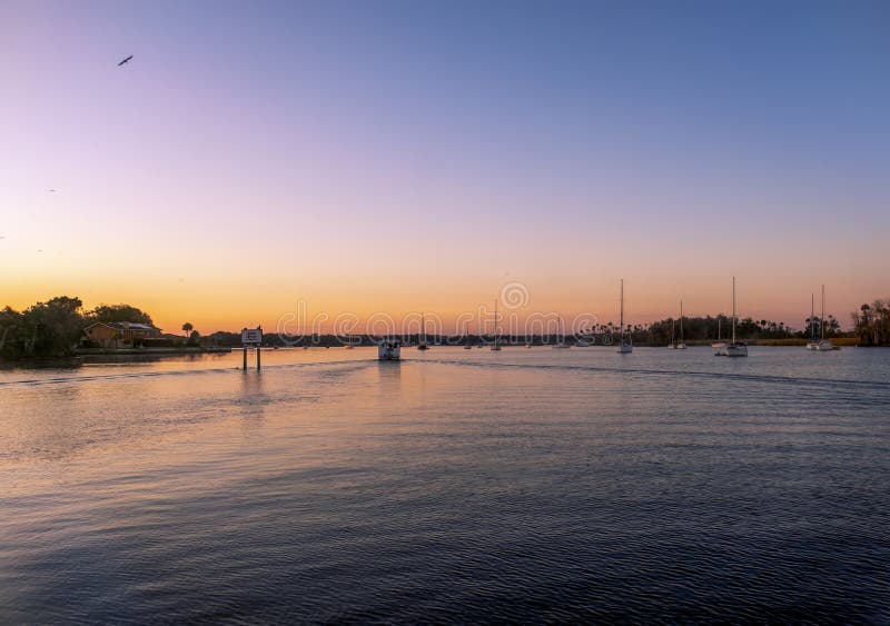 A Small Boat at Dawn in Crystal River, Florida Stock Photo - Image of ...