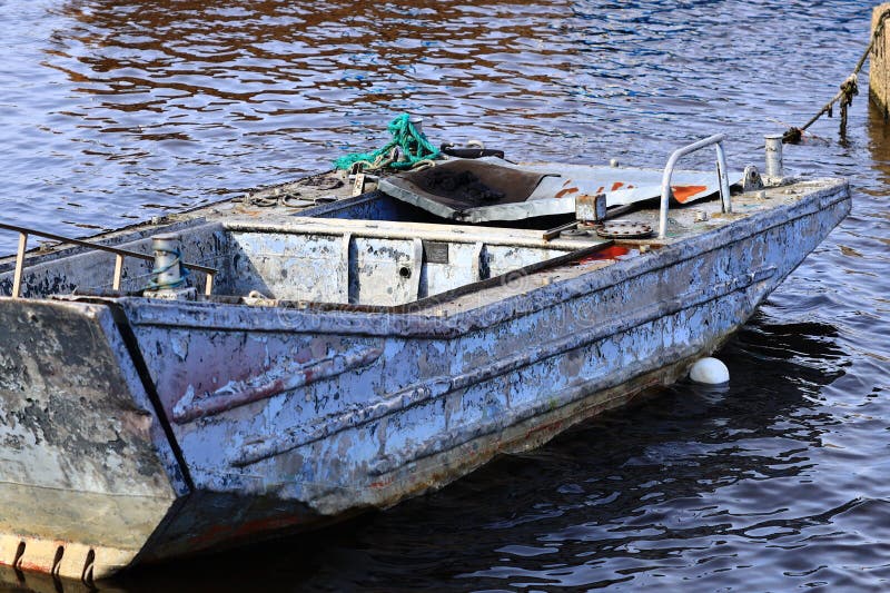 A Small Boat Floating on Calm Water, Great for Illustrations or ...