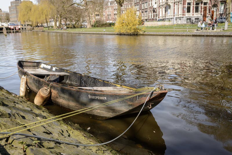 Small Boat Moored in a Canal in Amsterdam Netherlands. March 2015 ...