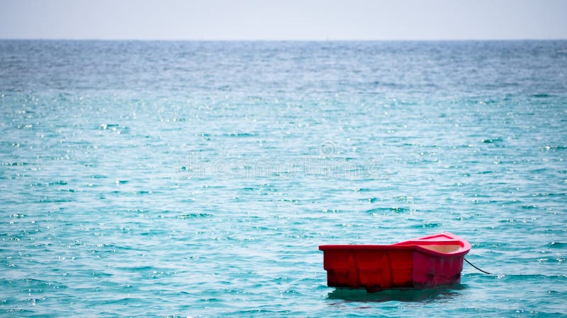 Small boat at ocean stock image. Image of vast, mountain - 67881537