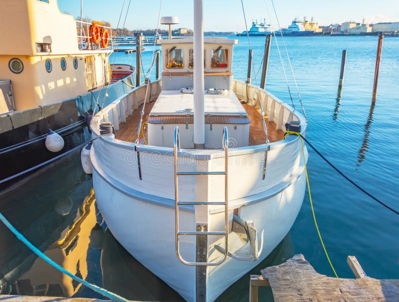 Small Boat at the Pier in the City, Direct View Stock Photo - Image of ...