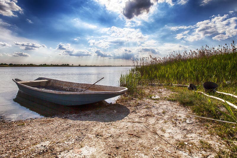 Small boat on the river stock photo. Image of fishing - 87807010