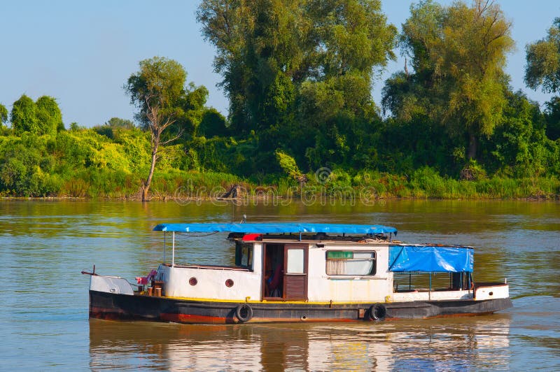 Small Boat Sailing on the River Stock Photo - Image of tourism, leisure ...