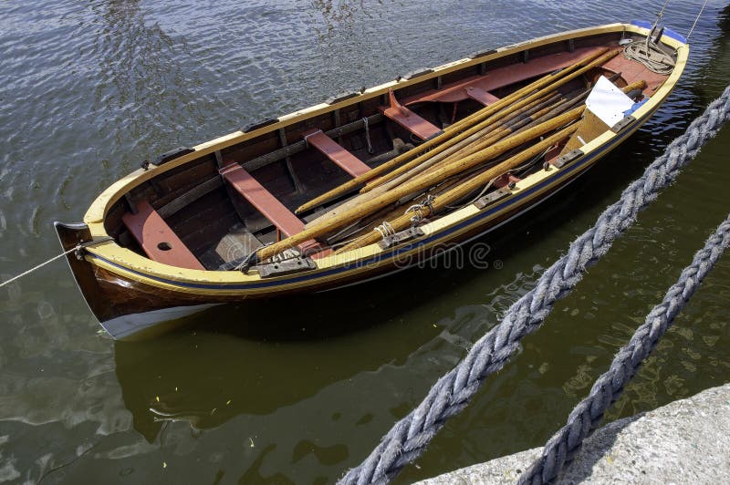 Small boat in the sea stock image. Image of rowboat - 217034927