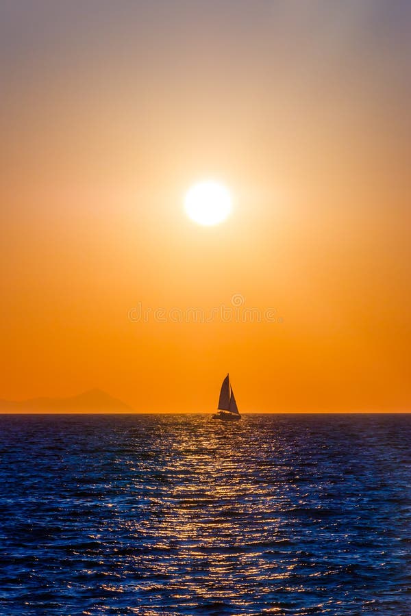 Small Boat on the Sea in Sunset Stock Photo - Image of ships, horizon ...
