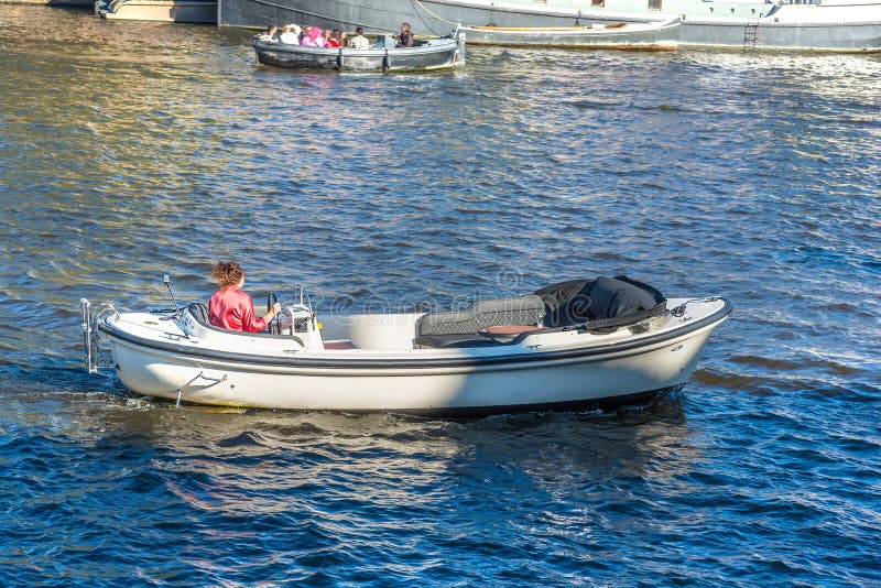 Small Boats on Amsterdam Canal Taking Cruise Stock Image - Image of ...