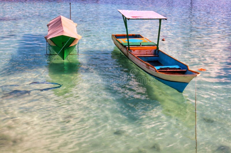 Small Boats Anchored in the Sea in the Afternoon. Stock Photo - Image ...