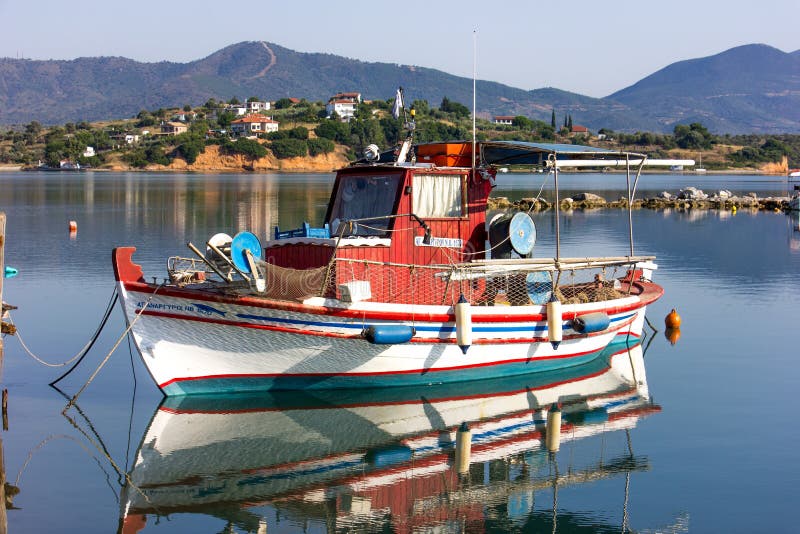 Small boats in Greek editorial photo. Image of coast - 57230211