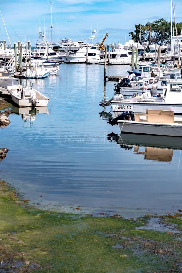 Small Boats Lining Waterfront in Wickford Cove Rhode Island Editorial ...