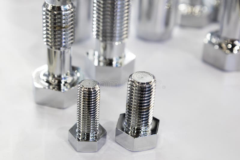 Small Bolts and Nuts by Manufacturing Process Stock Photo - Image of ...