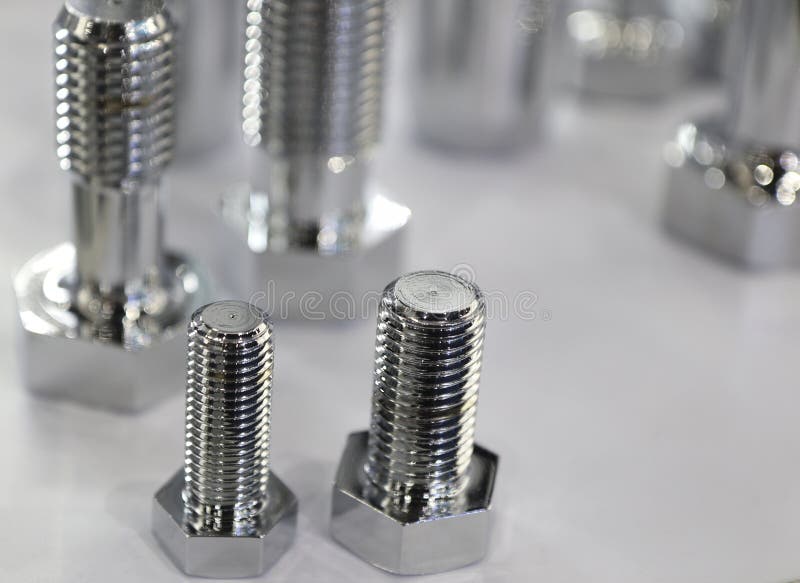 Small bolts and nuts stock image. Image of construction - 25453315