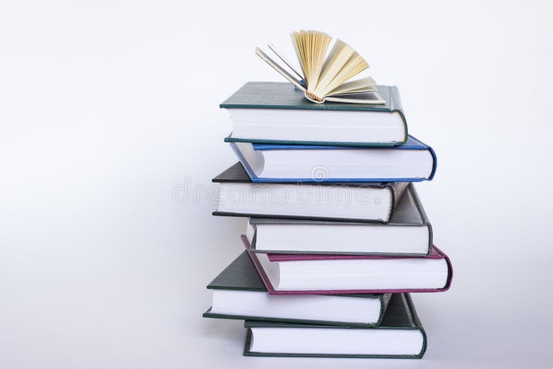 A Small Book on a Stack of Books Stock Image - Image of reading, books ...