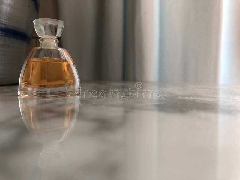 Small Bottle of Perfume in the Shape of a Pyramid 02 Stock Photo ...