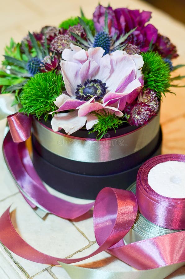 Small Bouquet with Pink Flower in a Box with Ribbons Stock Photo ...