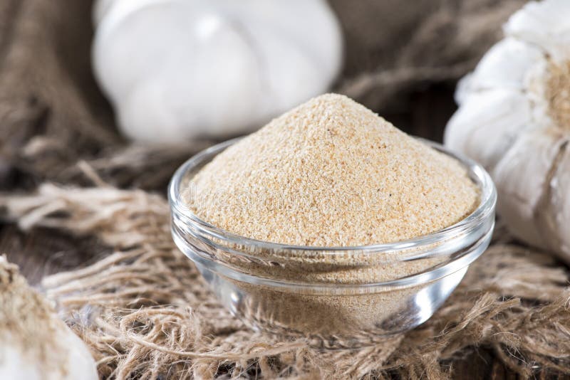 Garlic powder and cloves stock photo. Image of bulb, gourmet - 522944