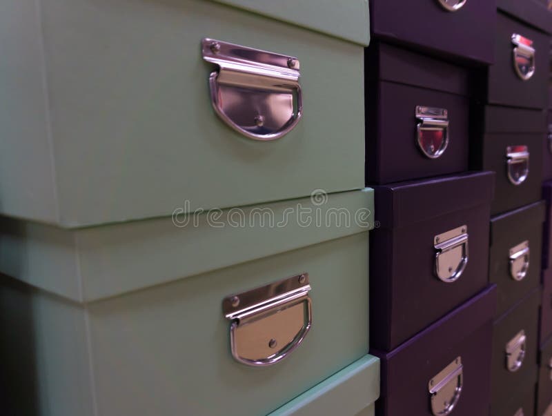 Small boxes stand in a row stock image. Image of closeup - 92595965