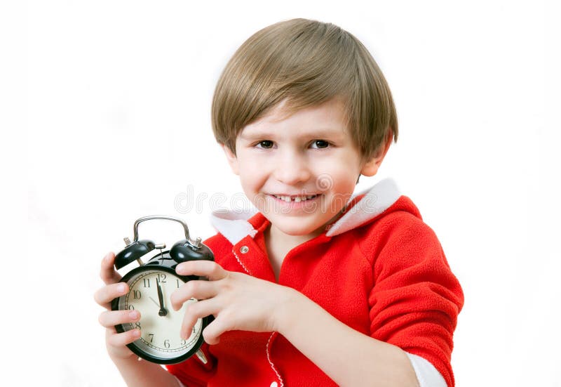 The Small Boy with Alarm Clock Stock Image - Image of hold, clock: 35532115