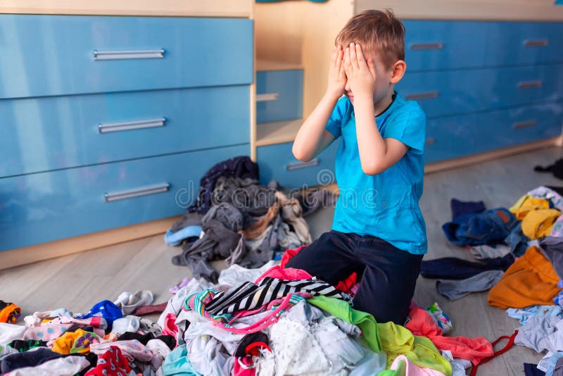 Small Boy Desperate with the Mess in His Clothes Stock Image - Image of ...