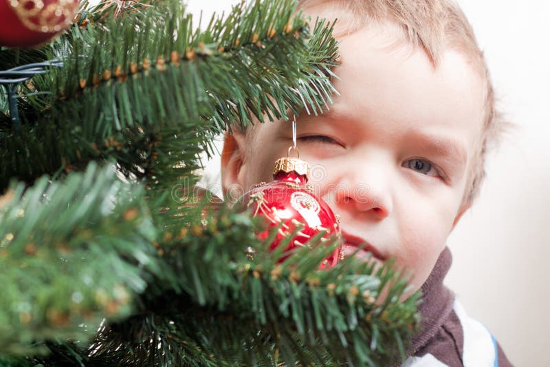 Sad Little Boy about the Christmas Tree. Stock Photo - Image of tree ...
