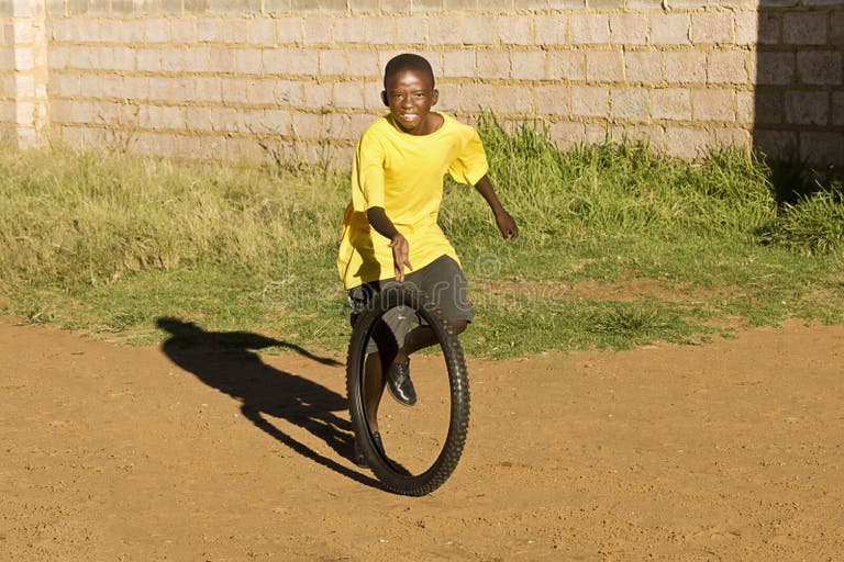 Africa Child Playing Wheel Stock Photos - Free & Royalty-Free Stock ...
