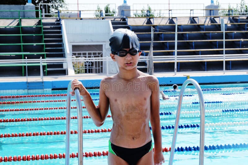 Small Boy Posing in Swimming Pool Stock Image - Image of white, person ...