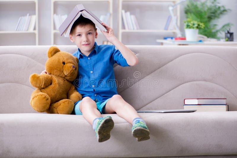 The Small Boy Reading Books at Home Stock Photo - Image of homework ...