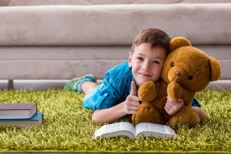 The Small Boy Reading Books at Home Stock Photo - Image of childhood ...