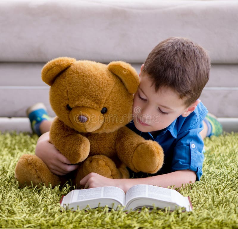 Small Boy Reading Books at Home Stock Photo - Image of cheerful ...