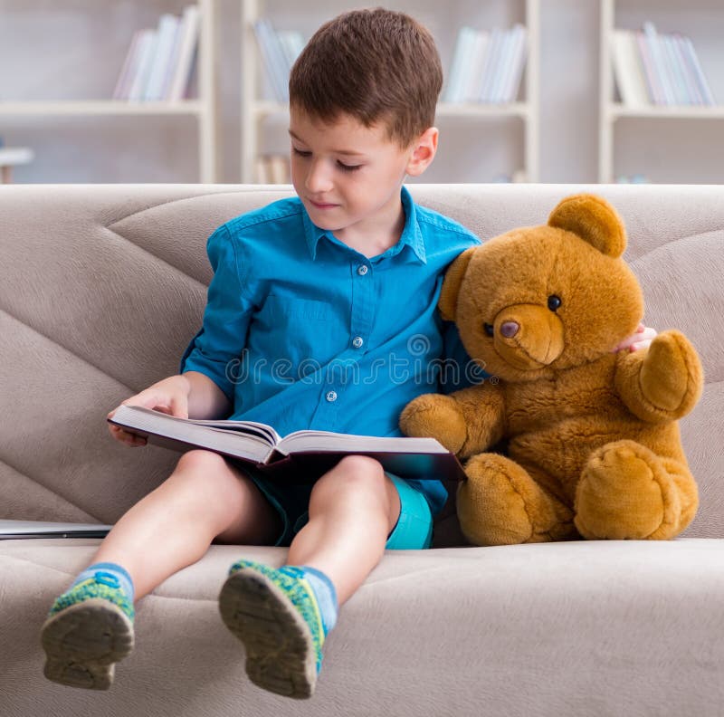 Small Boy Reading Books at Home Stock Photo - Image of education ...