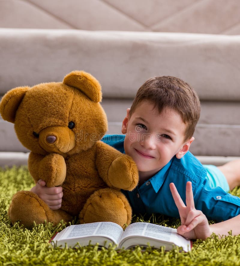 Small Boy Reading Books at Home Stock Photo - Image of education ...