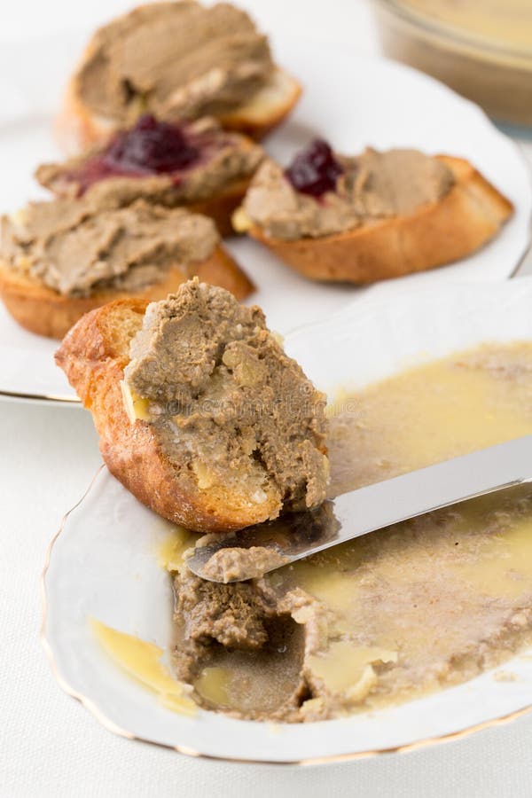Small Bread Pieces with Homemade Pate on White Plate Stock Photo ...