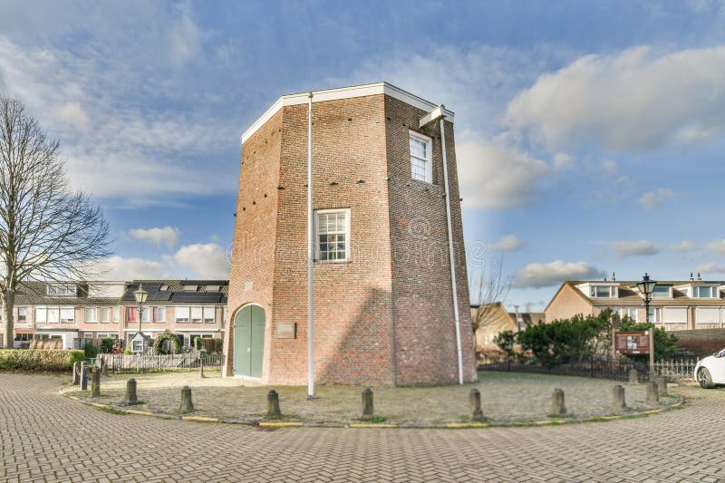 A Small Brick Tower in the Middle of a Circle Stock Photo - Image of ...