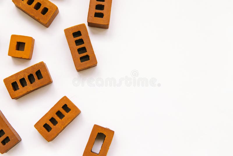 Small Bricks are Scattered on a White Background. Children`s ...