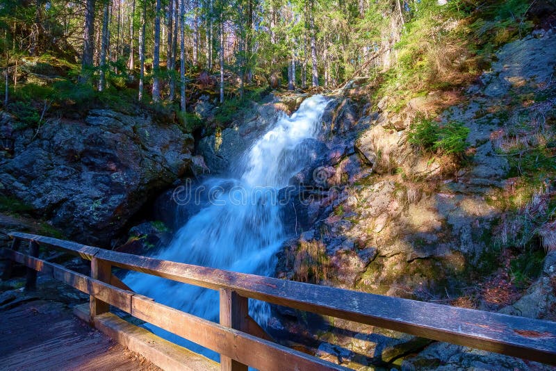 A Small Bridge in Front of a Waterfall Stock Photo - Image of cool ...