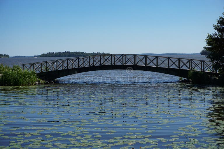 A small bridge over water stock photo. Image of urban - 320072922