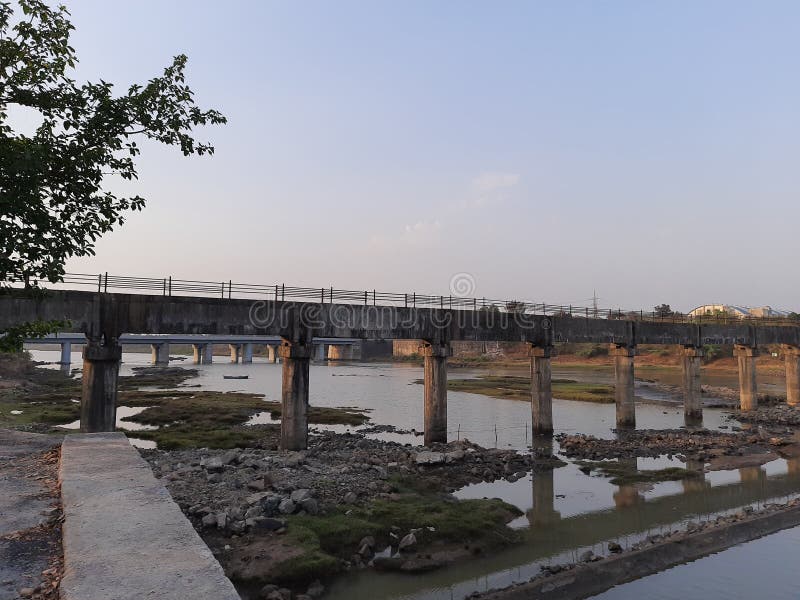 A Small Bridge and Under Going Water in a Village Stock Image - Image ...