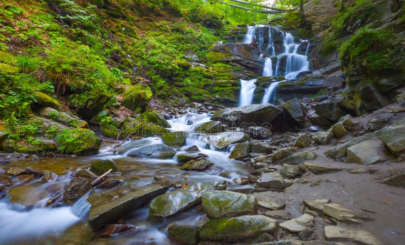Brook with Waterfall Flow among Green Mountain Stock Photo - Image of ...
