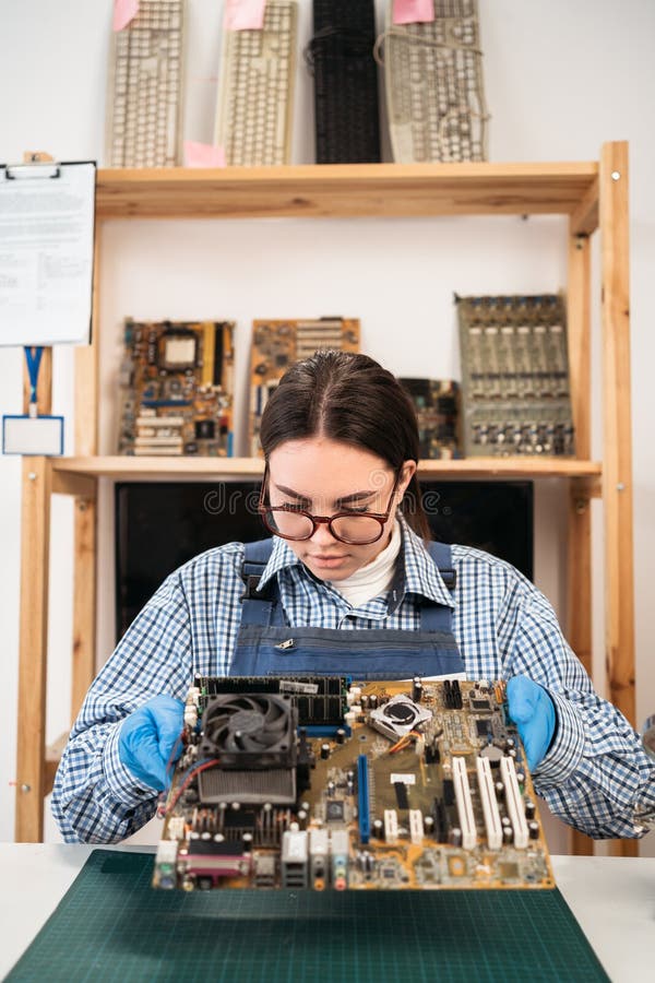 Small Business. Computer Female Technician or Engineer Working with ...