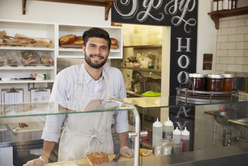 Small Business Owner Behind the Counter of a Sandwich Bar Stock Photo ...
