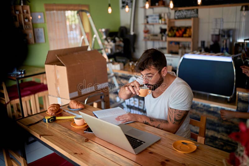 Small Business Owner In Coffee Shop Stock Photo - Image of smiling ...