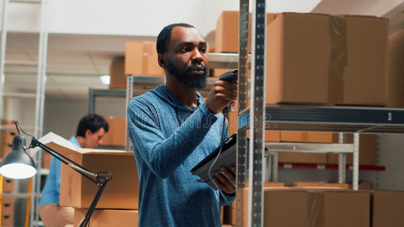 Small Business Owner Working on Distribution and Inventory Logistics ...