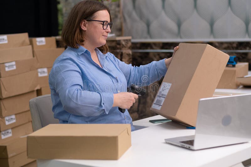Small Business Packaging Items Delivery at Her E-commerce Office ...