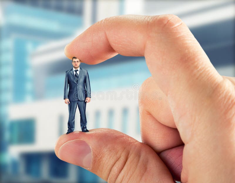 Small businessman in hand stock image. Image of leader - 30328521