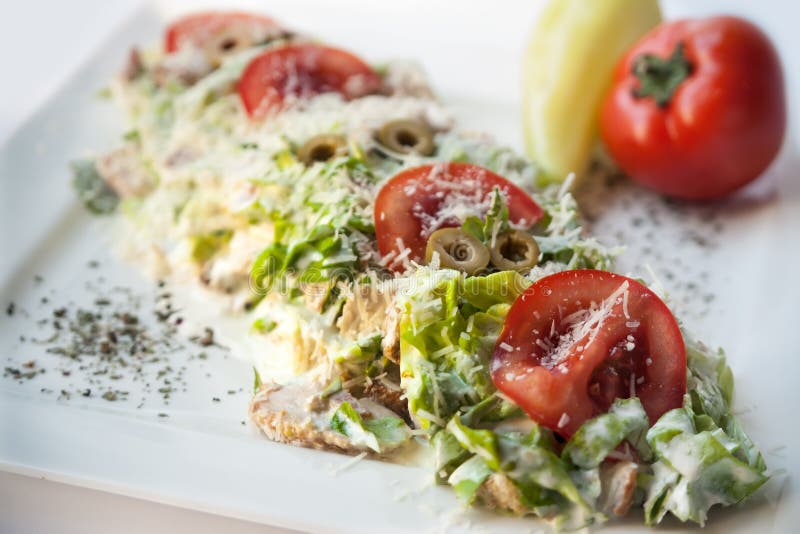 A Small Caesar Salad with Shredded Parmesan Cheese, Croutons and Stock ...