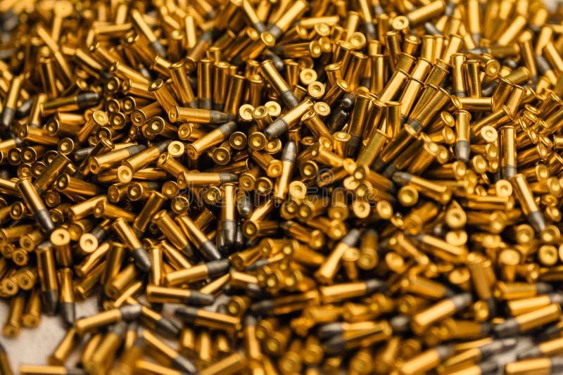 Small-caliber Bullets on White Table at Production Plant Stock Photo ...