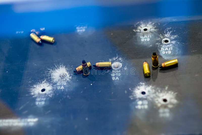 Small Caliber Cartridges. Samples of Bullet Holes Stock Image - Image ...